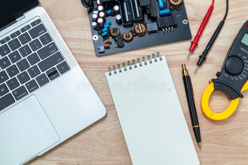 Measuring the Electronic Components on the Motherboard of the Computer ...