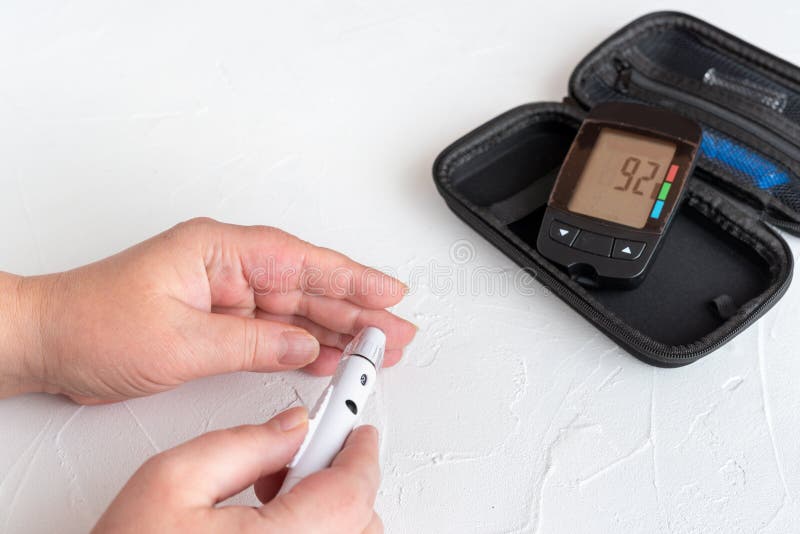 Measuring Glucose Level Blood Test with Glucometer Stock Image - Image ...