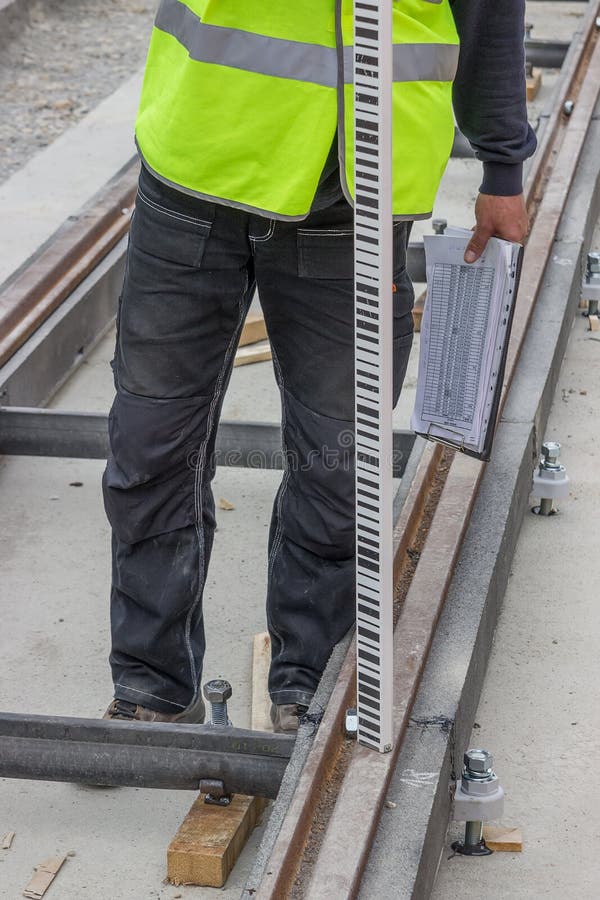 Measuring Height by Optical Levelling Stock Image - Image of measuring ...