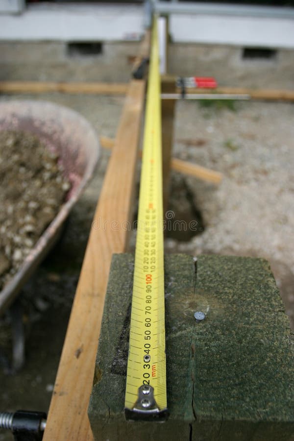 Measuring the job stock image. Image of construction, foundation - 1565827