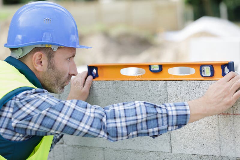 Measuring level in site stock image. Image of cement - 266506909