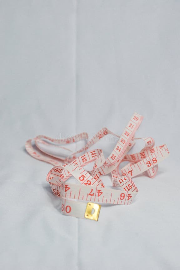 Measuring Lint with Red Numbers Stock Photo - Image of fashion, font ...