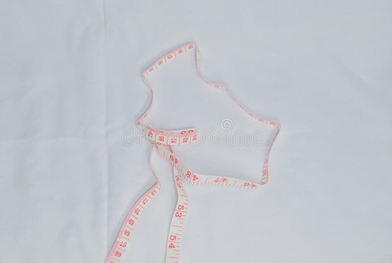 Measuring Lint with Red Numbers Stock Photo - Image of fashion, label ...