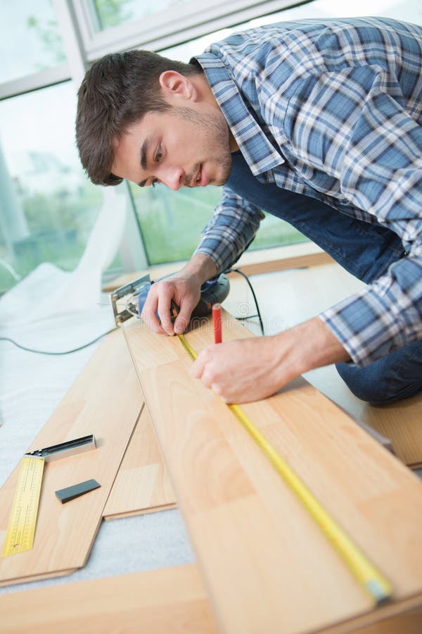 He measuring and marking stock photo. Image of vocational - 312438800