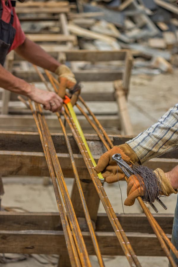 Measuring and Marking Steel Rods for Making Beam Cages 2 Stock Image ...