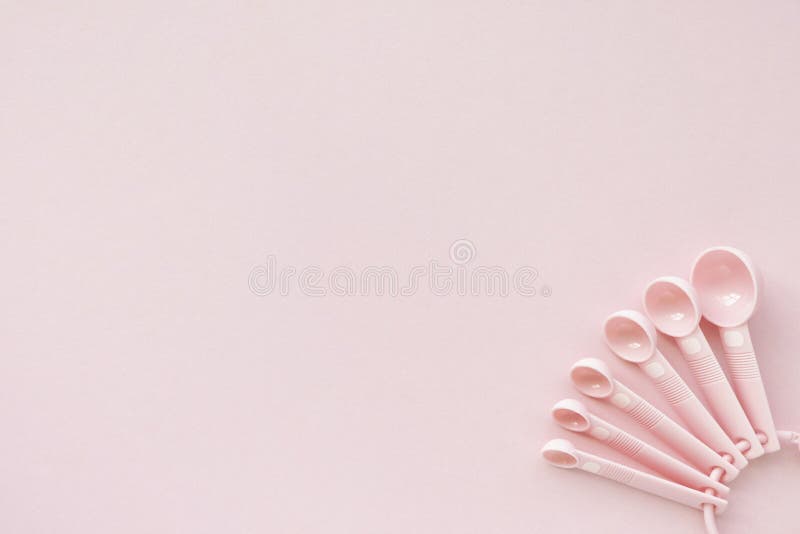 Measuring Plastic Spoon in Pink Color on Pink Background, Top View ...