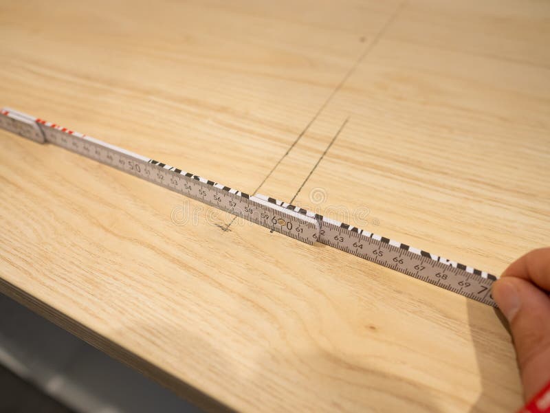 Measuring the Position with a Folding Ruler Stock Photo - Image of ...