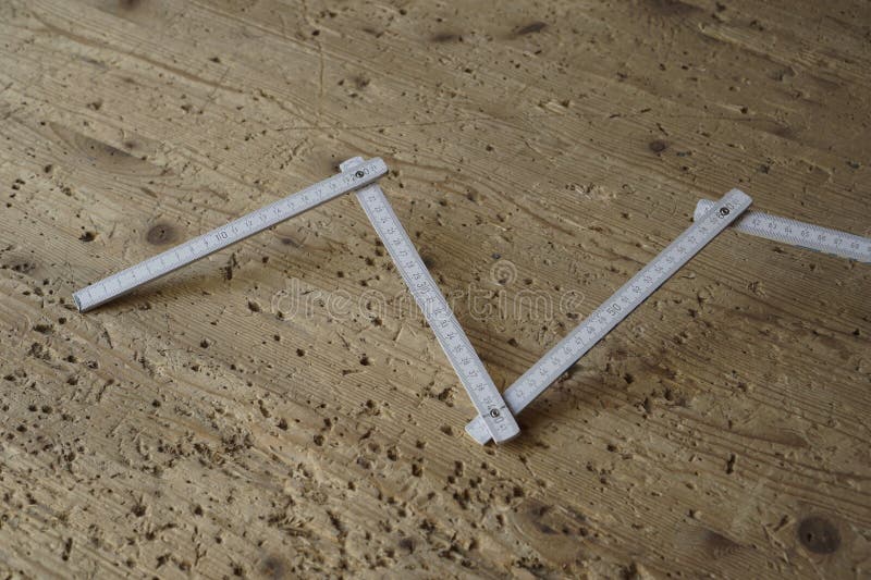 Measuring Ruler on the Background of the Old Board Stock Photo - Image ...