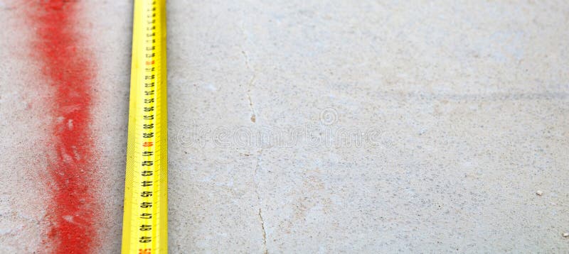 Measuring Ruler on a Concrete Wall Texture Stock Image - Image of ...
