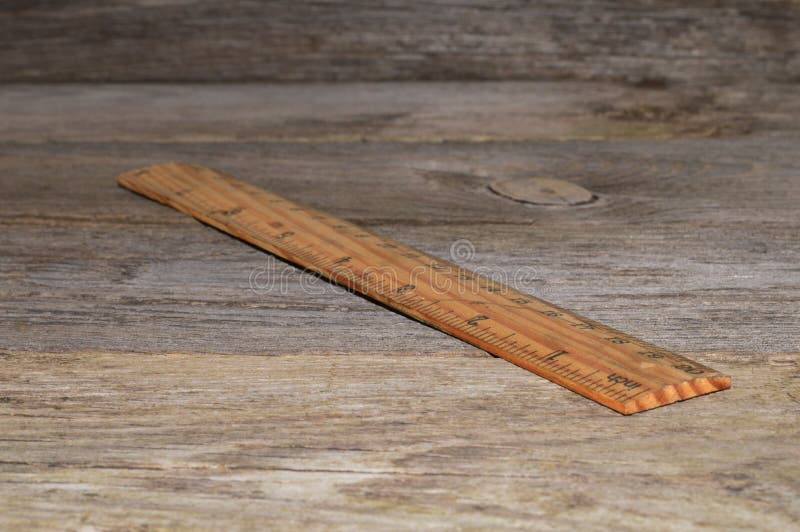 Measuring Ruler Isolated on Wooden Background - Close-up Stock Image ...