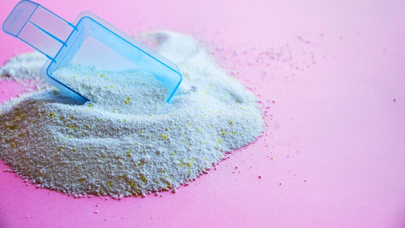 Measuring Scoop with Laundry Powder on Multi-colored Background Stock ...