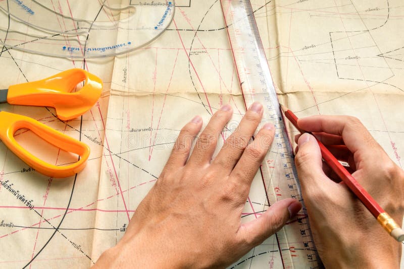 Measuring a sewing layout stock image. Image of curve - 76617961
