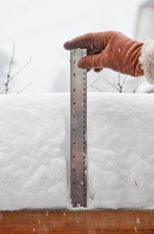 Measuring snow stock photo. Image of december, february - 22933130