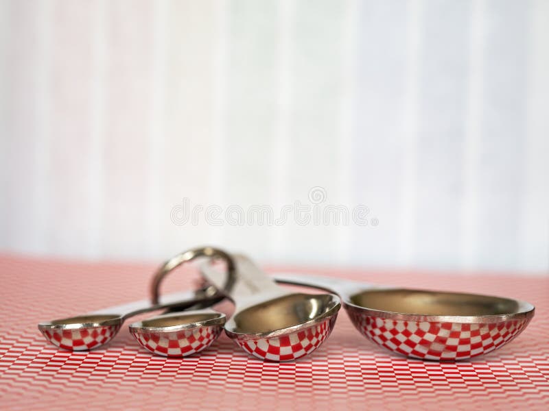 Measuring Spoons on Red and White Checkered Material Stock Image ...