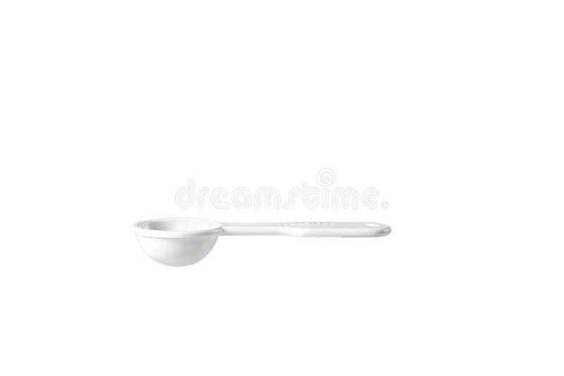 White Measuring Spoons Isolated on a while Background Stock Photo ...