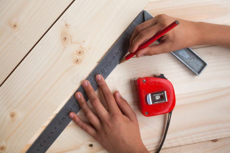 Measuring with a square stock photo. Image of distance - 260175896