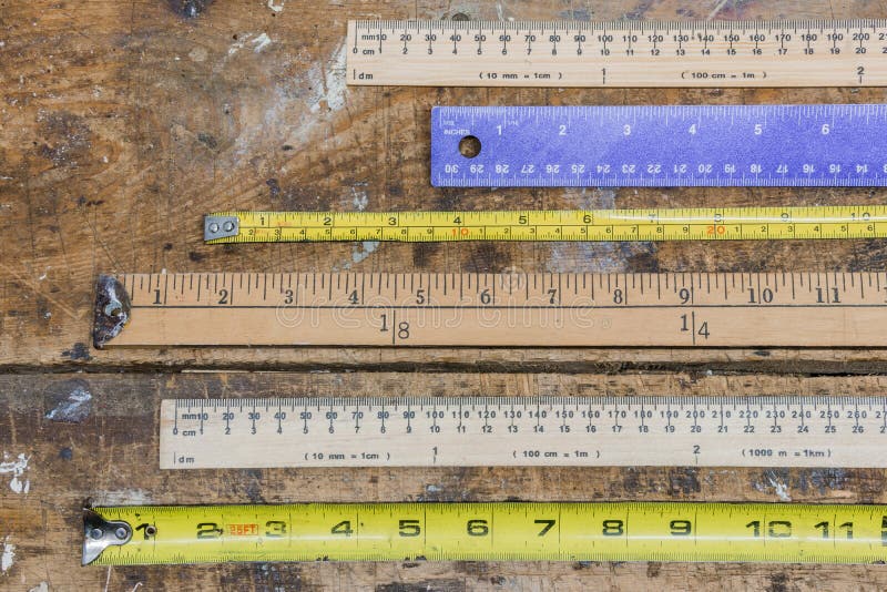 Measuring Sticks, Rulers, Tape Measures on Workshop Table in Lin Stock ...