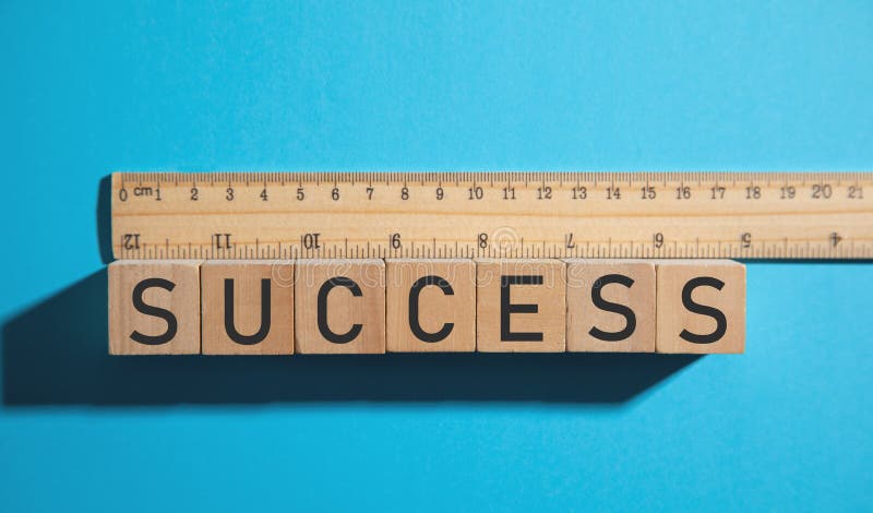 Measuring Success. Ruler with Success Text on Wooden Cube Stock Image ...