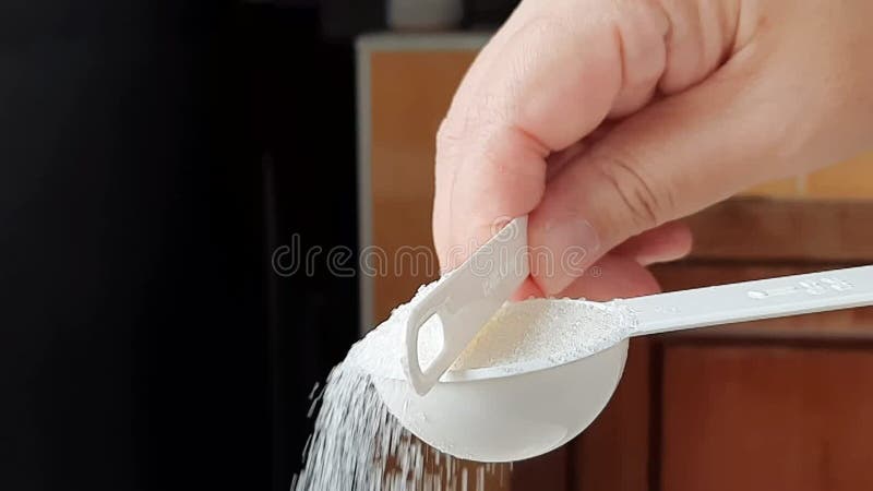 Measuring Sugar stock video. Video of motion, white - 282028369