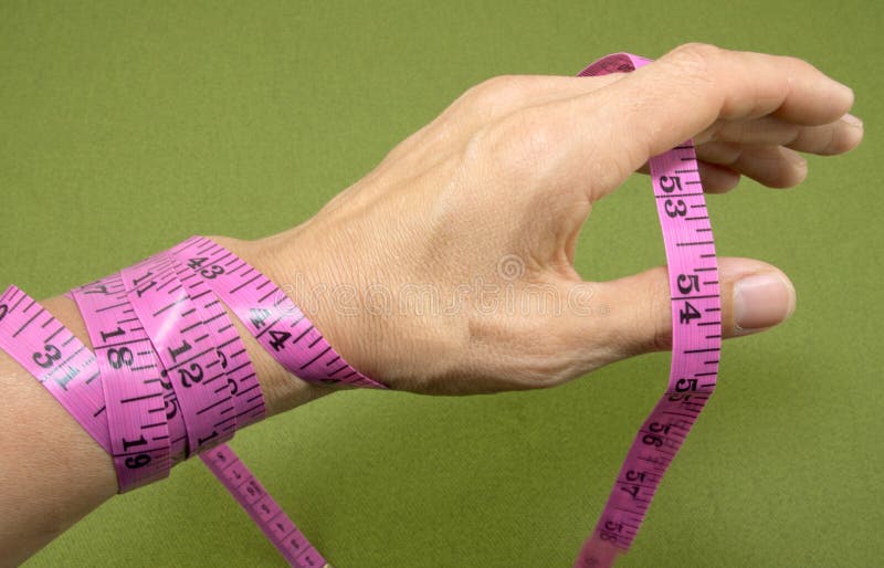 Measuring Tape Wrapped Around White Blank Board Stock Photo - Image of ...