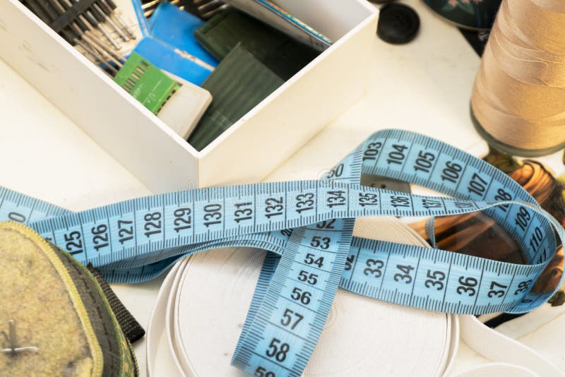 Craft Supplies Arranged with Measuring Tape on a Workspace Stock Image ...