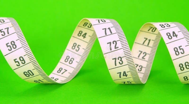 Measuring Tape on Green stock photo. Image of measure - 2057772
