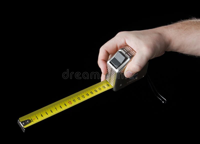 Measuring Tape In Hand. Picture Image: 4270055