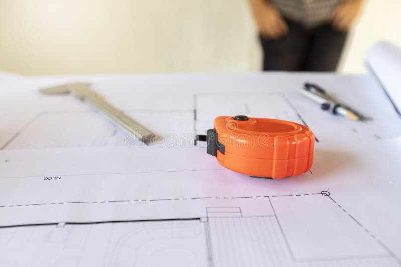 A Measuring Tape on House Blueprint Plan Stock Photo - Image of ...