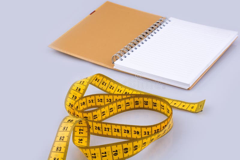 Measuring tape stock image. Image of notebook, measure - 73156727