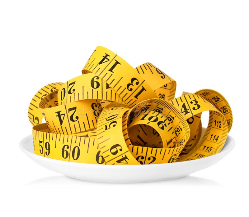 Measuring tape on a plate stock photo. Image of plate - 312976460