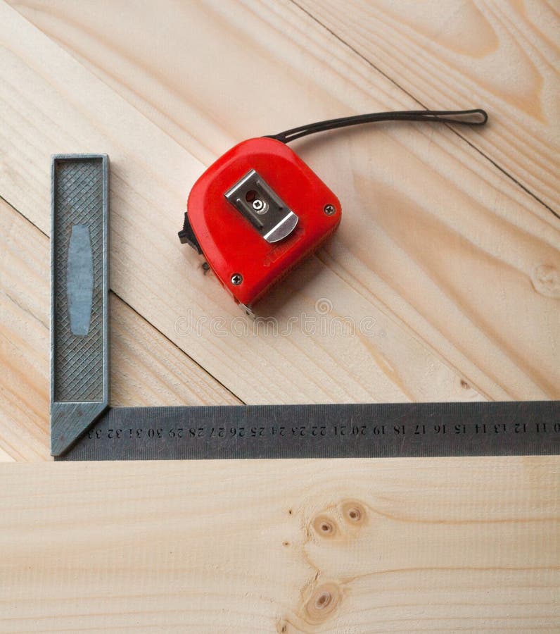 A Measuring Tape and a Square Stock Photo - Image of industry, lumber ...