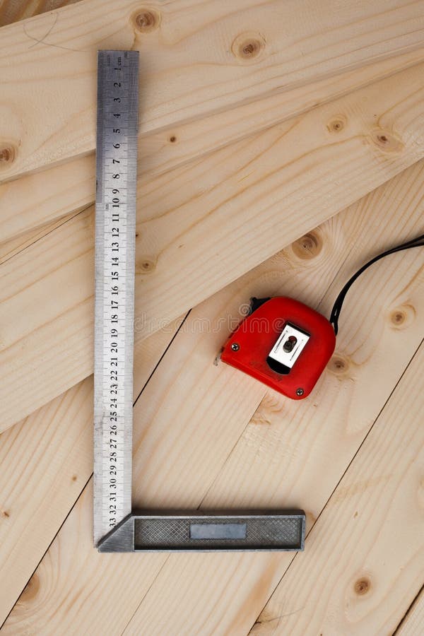 A Measuring Tape and a Square Stock Photo - Image of lumber, joiner ...