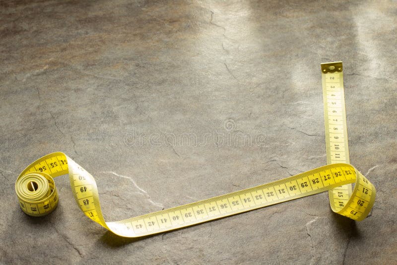 Measuring tape on table stock photo. Image of fabric - 81709586