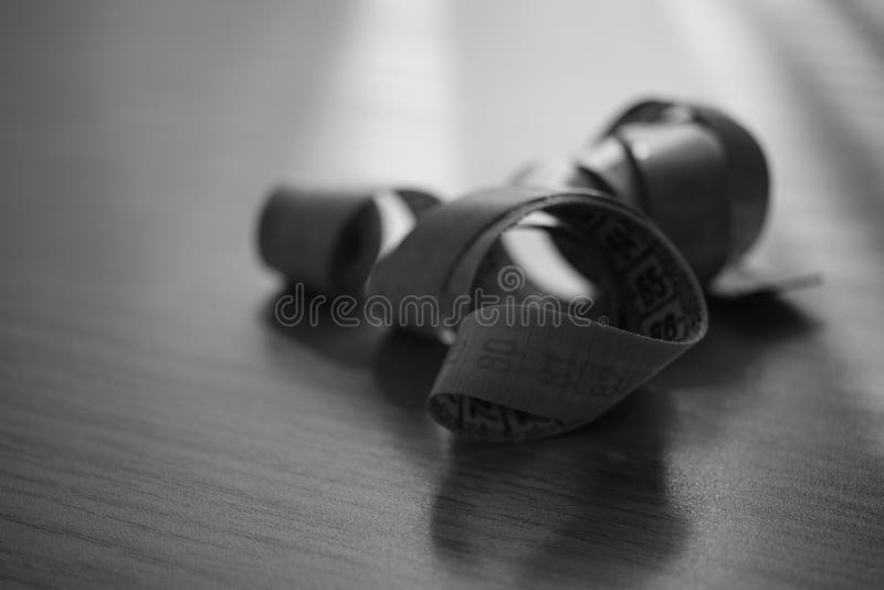Measuring Tape on the Table. Black and White Photo Stock Image - Image ...