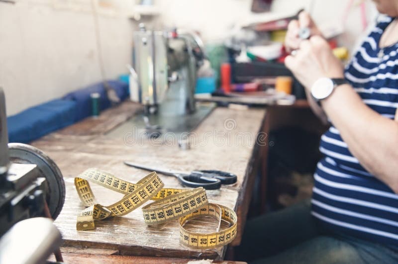 Measuring Tape on the Table. Seamstress Working Stock Image - Image of ...