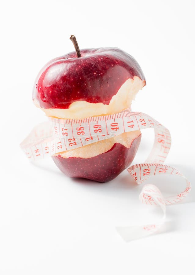 Measuring Tape Wrapped Around Apple As a Symbol of Diet. Stock Image ...