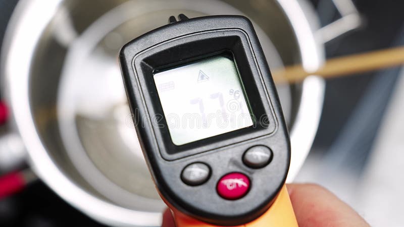 Measuring Temperature of Molten Gel during Candle Making Stock Footage ...