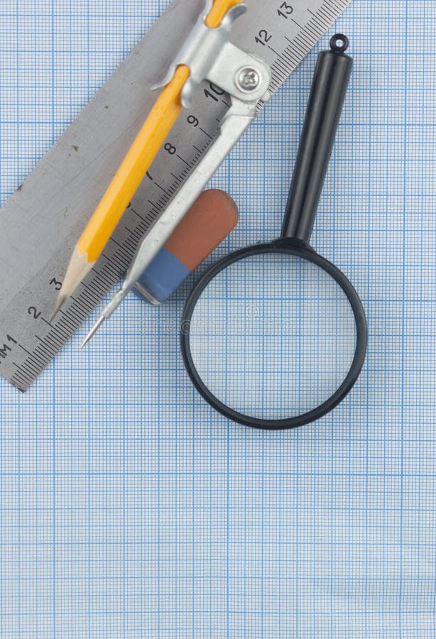 Measuring Tools Above Blue Graph Paper Stock Photo - Image of ...