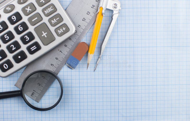 Measuring Tools Above Blue Graph Paper Stock Photo - Image of work ...