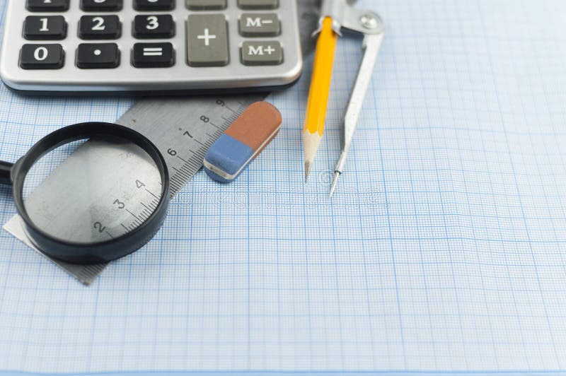 Measuring Tools Above Blue Graph Paper Stock Photo - Image of shape ...