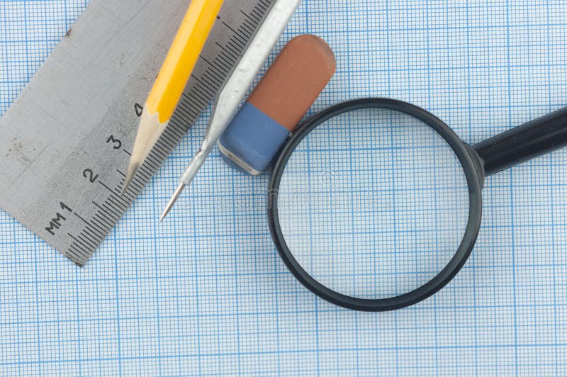 Measuring Tools Above Blue Graph Paper Stock Photo - Image of ...