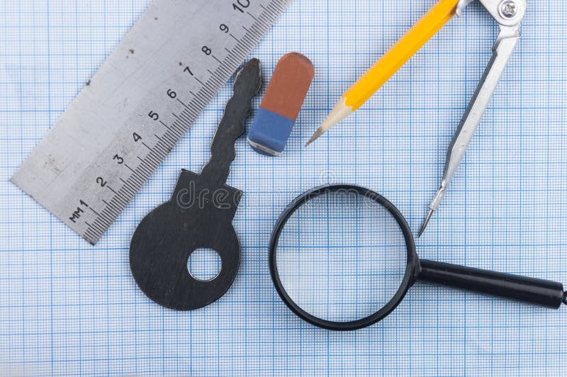 Measuring Tools Above Blue Graph Paper Stock Photo - Image of designer ...