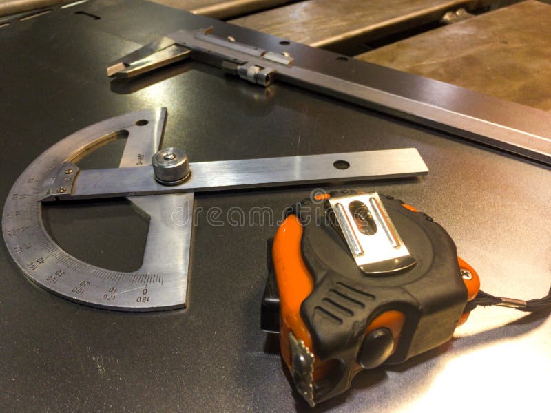 Measuring Tools Lie on a Sheet of Metal Stock Image - Image of metal ...