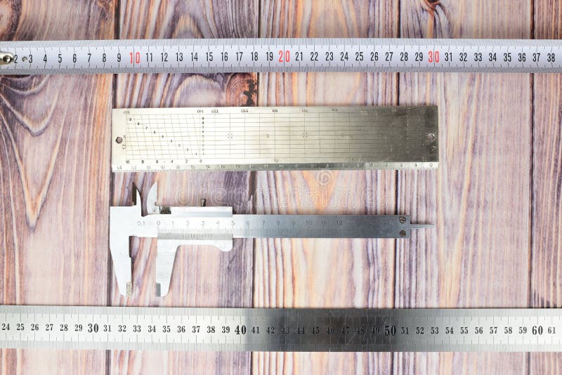 Measuring Tools, Rulers, Vernier Calipers and Tape Measure Stock Photo ...