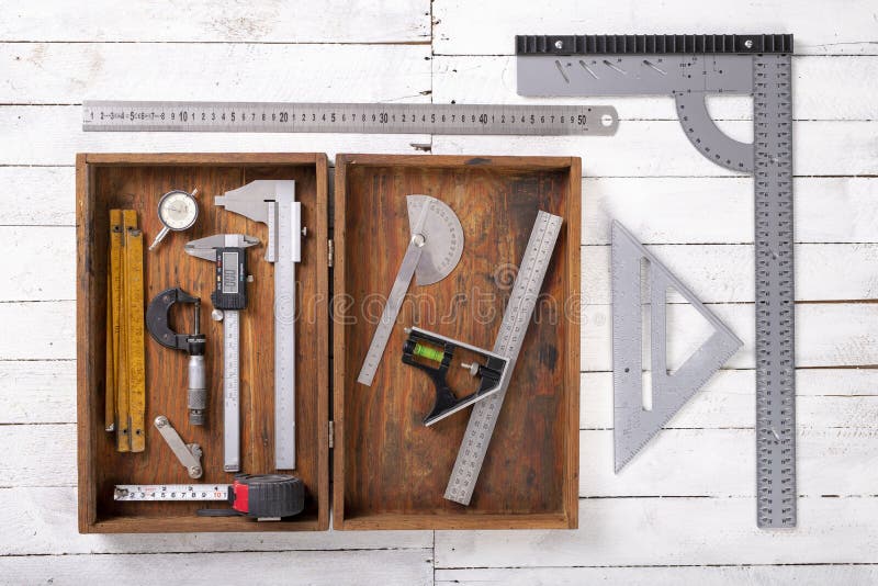 Measuring Tools in a Wooden Case and on a Table. Accessories for ...