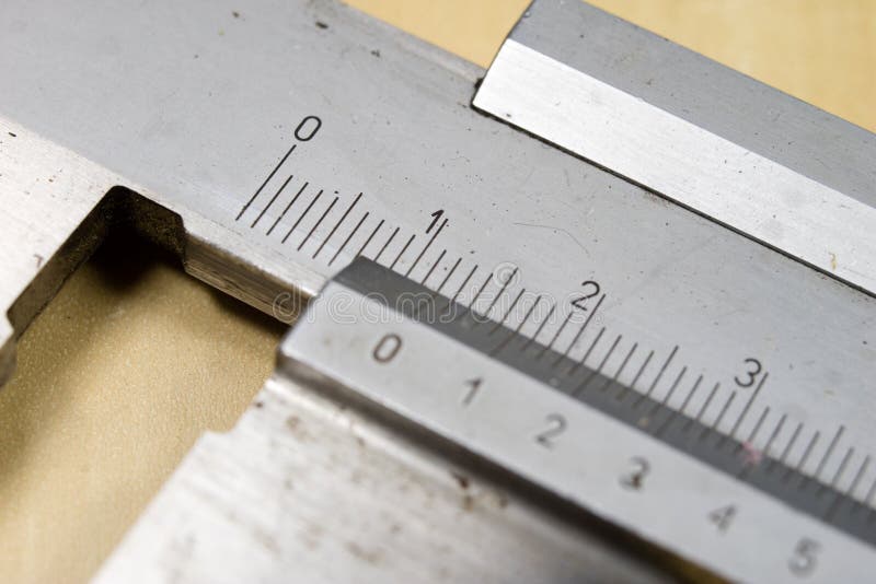 Measuring Tools in the Workshop. Caliper for Locksmith Work on a Stock ...