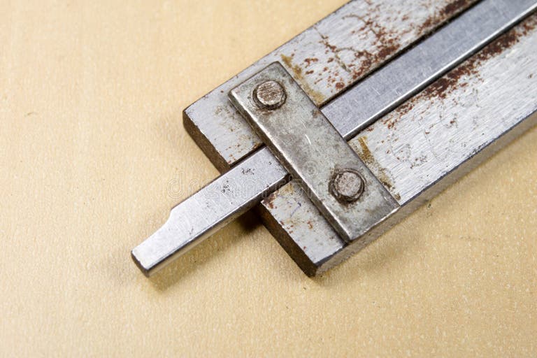 Measuring Tools in the Workshop. Caliper for Locksmith Work on a Stock ...