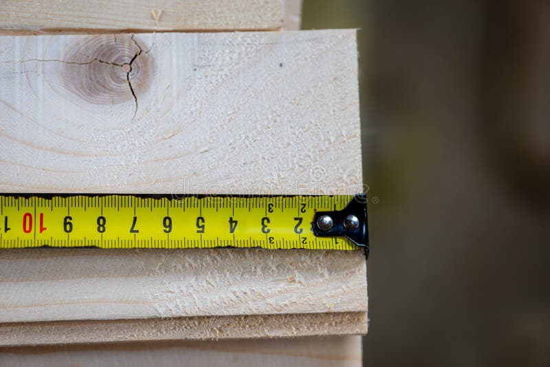Measuring Wood To Be Cut with a Measure Stock Photo - Image of industry ...