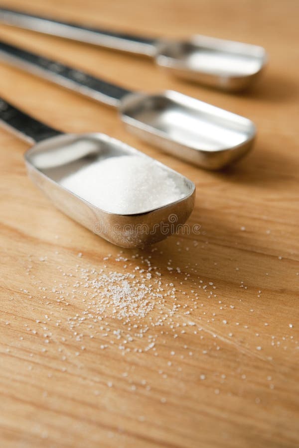 Measurings Spoons on Wood Counter with Sugar Stock Image - Image of ...