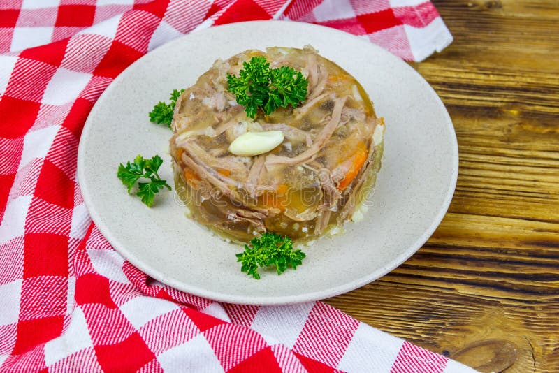 Meat Aspic in a Plate on Wooden Table. Traditional Russian Dish Stock ...